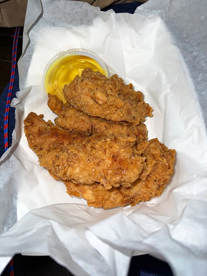 Chicken tenders that actually live up to their name – genuinely tender, with a golden crust that shatters just right. The honey mustard sauce is liquid gold.