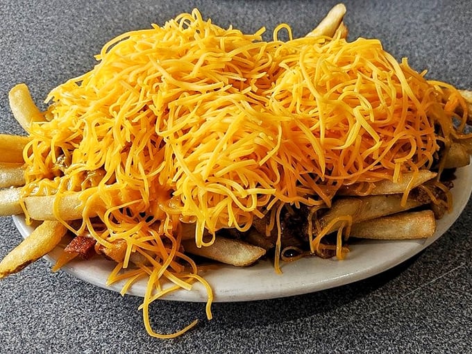 Chili cheese fries that laugh in the face of diet plans—a glorious mess of crispy potatoes, savory chili, and that unmistakable cheese.