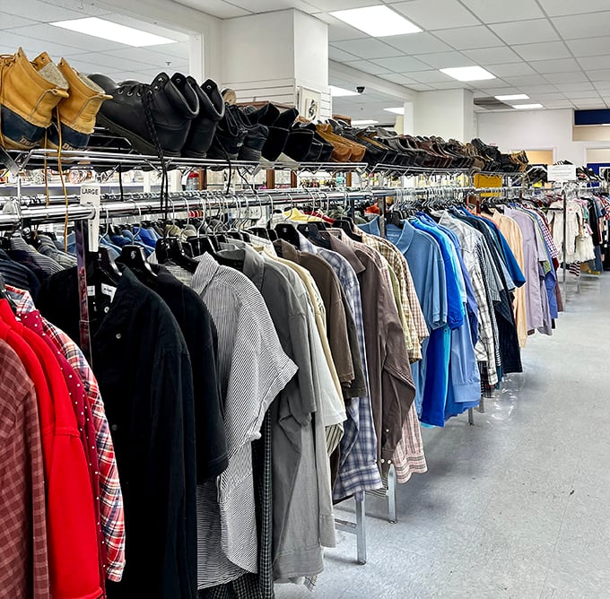 The men's section—where dress shirts and casual wear hang in perfect formation, like a regiment ready for your next job interview or backyard BBQ. 
