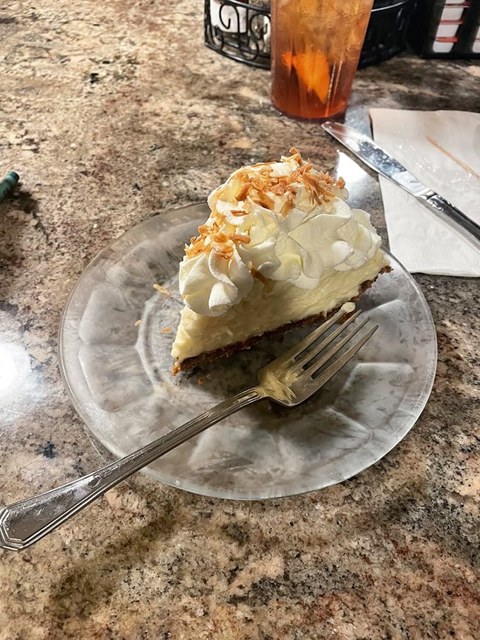 Coconut cream pie that makes you want to write poetry—cloud-like filling topped with whipped cream and toasted coconut for that perfect textural contrast.