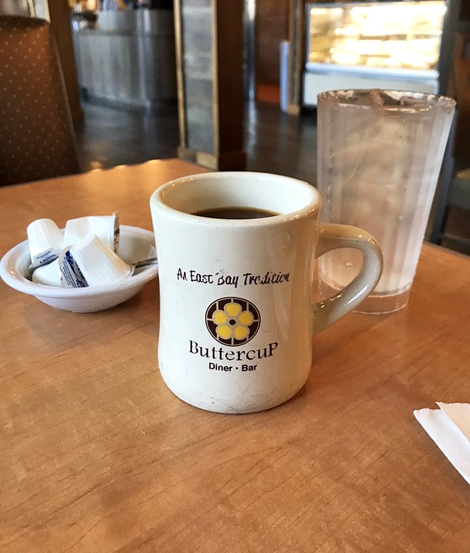 An East Bay Tradition" – the mug says it all. This isn't just coffee; it's a warm Oakland handshake. 