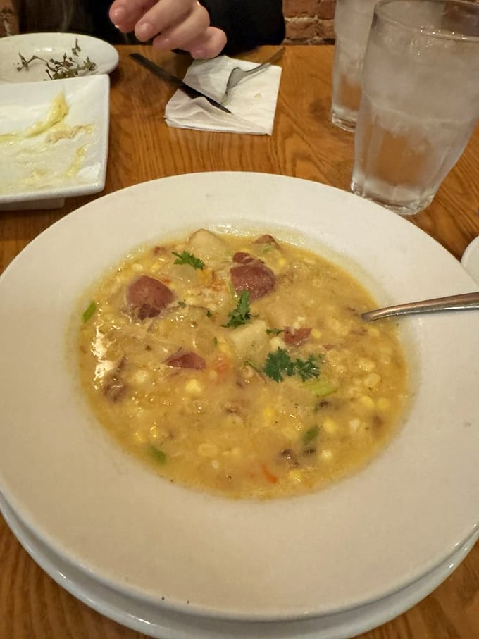 Corn chowder that tastes like summer vacation memories, with chunks of potato playing hide-and-seek in creamy golden goodness.