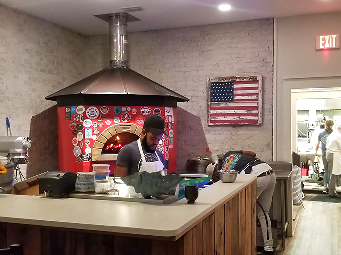 The host stand welcomes you like an old friend, with reclaimed wood that whispers tales of coastal adventures past.