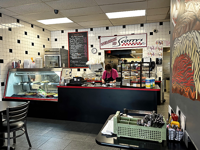 The heart of operations—where breakfast dreams come true. That classic black and white tile pattern screams "trust us with your hunger."
