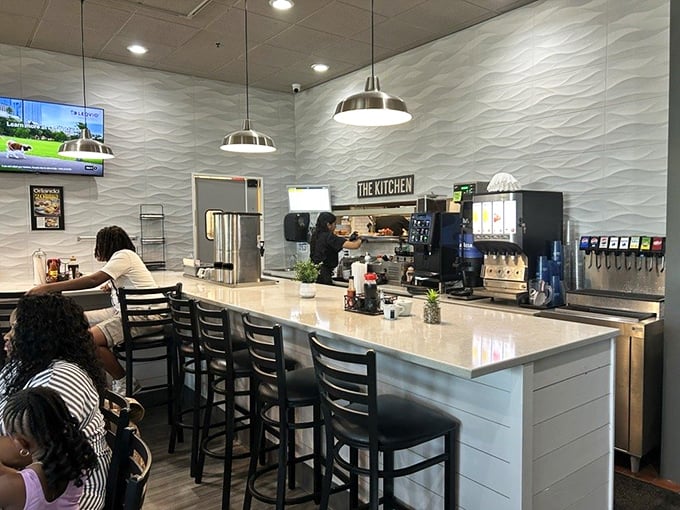 The open counter design lets you watch breakfast magic happen while you wait for yours.