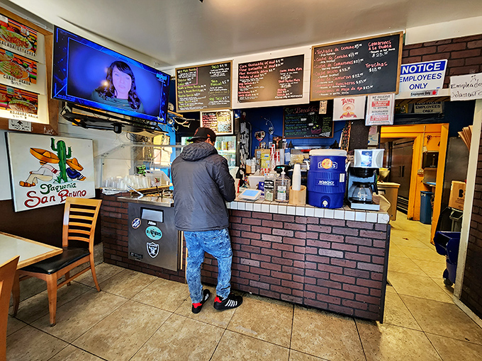 The ordering counter—that magical threshold where dreams of perfect tacos begin their journey to delicious reality.
