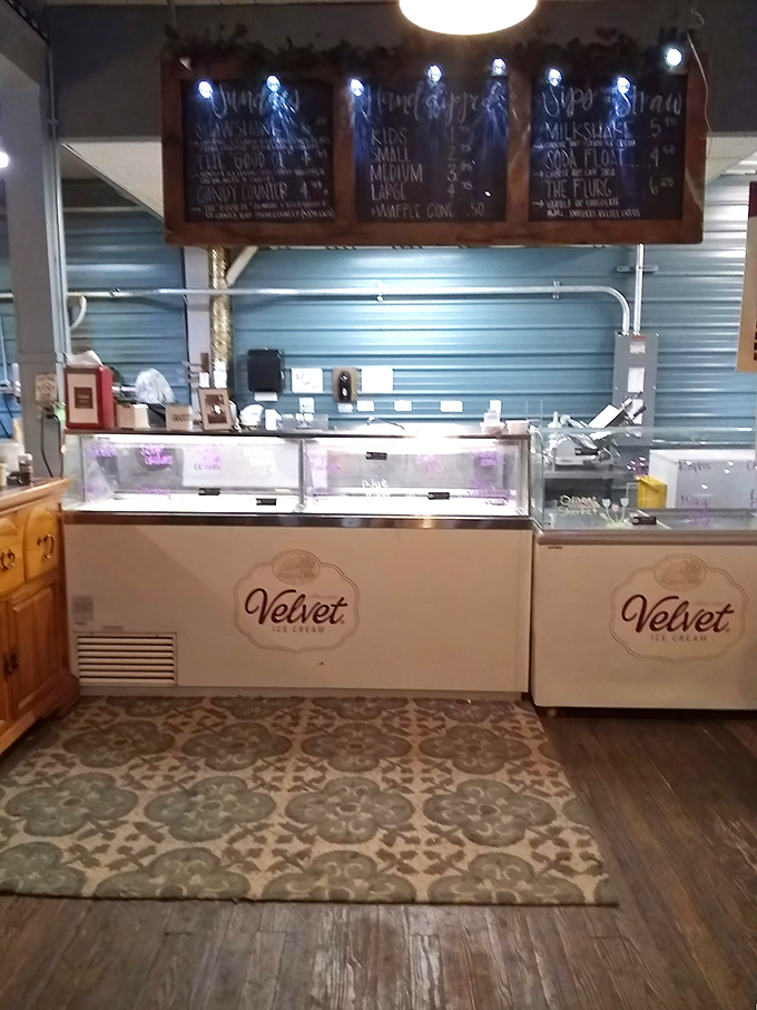 Velvet Ice Cream awaits beneath handwritten menu boards, offering sweet relief after the delicious dilemma of choosing between sandwich masterpieces.