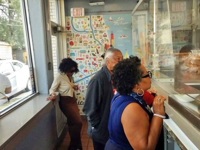 A Chicago map on the wall reminds you where you are, but your nose already knew—you're in barbecue paradise.