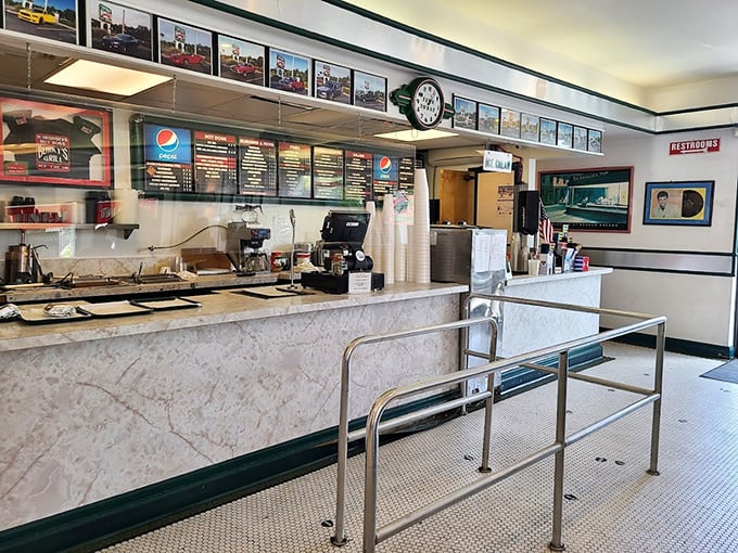 The ordering counter—where dreams come true and diet plans go to die. Worth every moment of treadmill penance that follows.