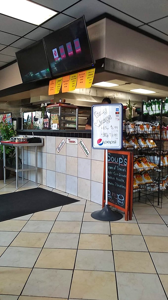The menu board and counter area showcase the operation's efficiency. Like a well-choreographed dance, orders move from concept to delicious reality.