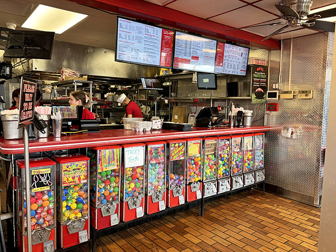 The counter area features a lineup of candy machines that remind us some of life's simplest pleasures come in quarter-turn portions.