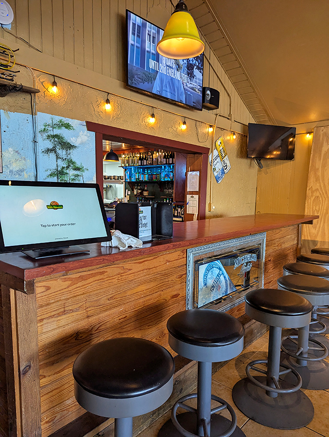 The bar beckons with the promise of cold drinks and local gossip. Those stools have supported the weight of countless fishing stories—most of them true.