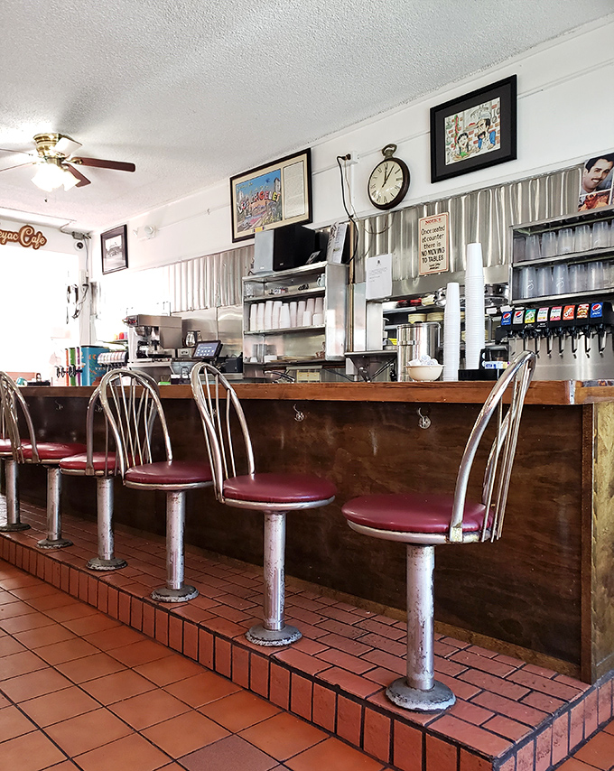 The counter seats offer front-row tickets to the culinary show—where regulars perch like honored guests at the altar of authentic Mexican cuisine.