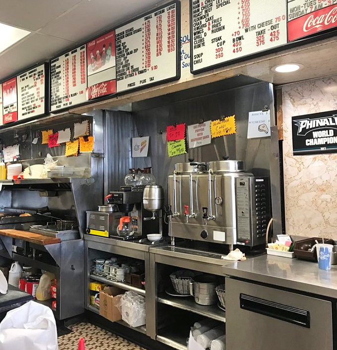 Where decisions are made and appetites are satisfied. The menu board's simplicity belies the complexity of flavors waiting below.