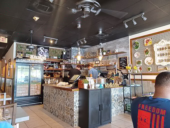 Behind this counter, culinary magic happens. The open kitchen concept means you can watch your food being prepared—dinner and a show!