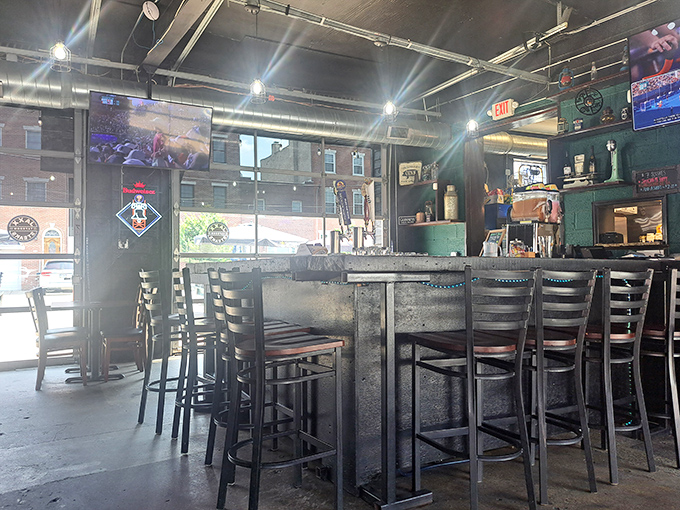 The bar counter—where solo diners feel welcome, sports debates are settled, and bartenders remember your usual after just two visits.