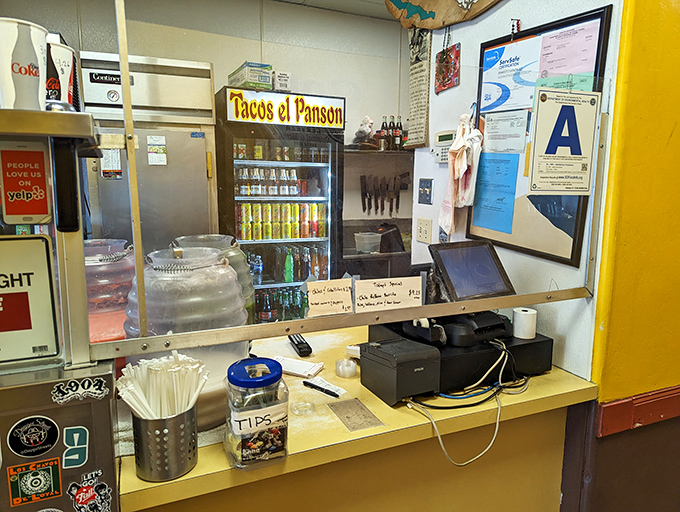 The counter where dreams are ordered and culinary magic begins, complete with tip jar and friendly service.