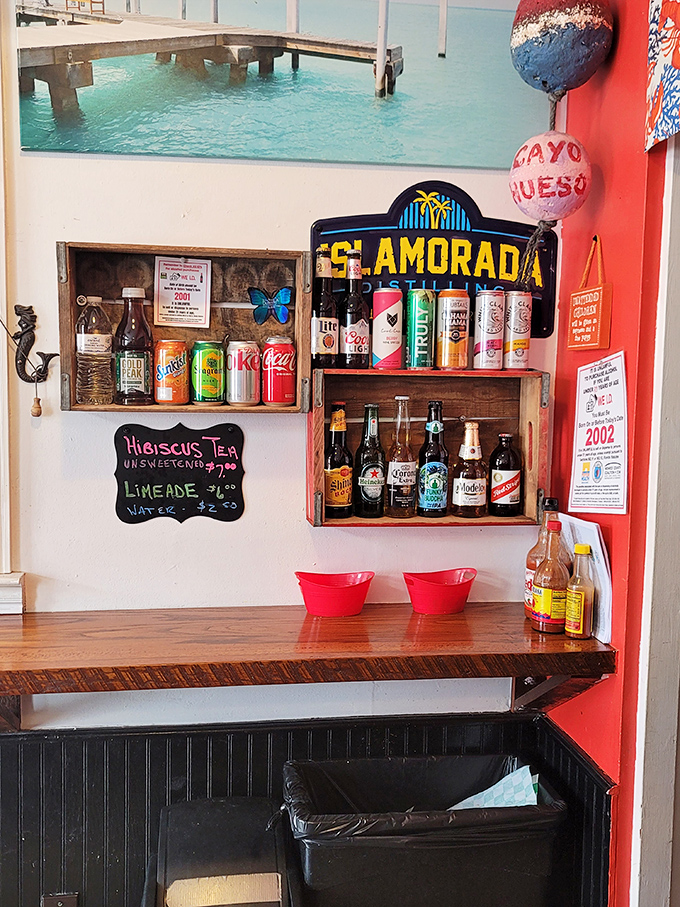 The drink selection proves you don't need fancy cocktails when you've got cold beer and island vibes. Simplicity is the ultimate sophistication.
