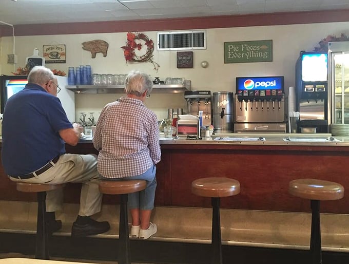 That sign says it all: "Pie Fixes Everything." Truer words have never been hung above a soda fountain.
