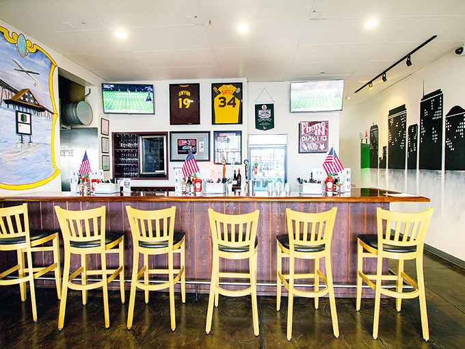 Sports jerseys and seafood—a uniquely American pairing. The bar seating offers front-row views of both the game and your meal's preparation.