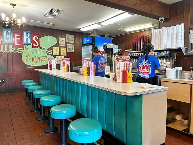 The counter seats—where solo diners become regulars, and regulars become family, all while watching the choreographed dance of short-order cooking.