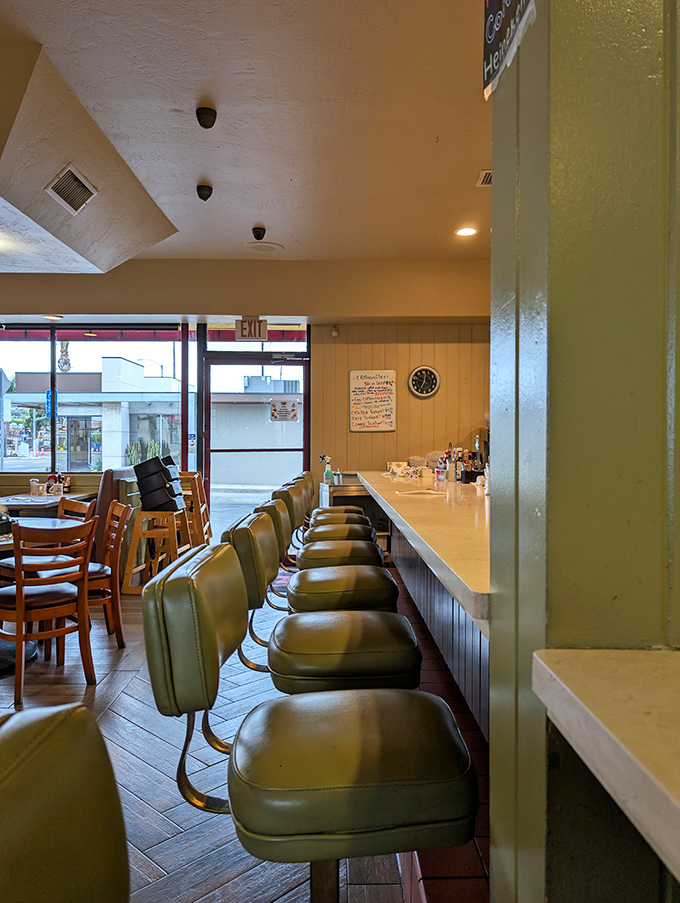 The counter—where solo diners find community and everyone gets a front-row seat to the kitchen symphony.