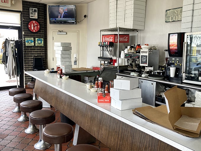Classic diner counter seating—where solo diners become part of the HoneyDip family and coffee cups are never empty for long.