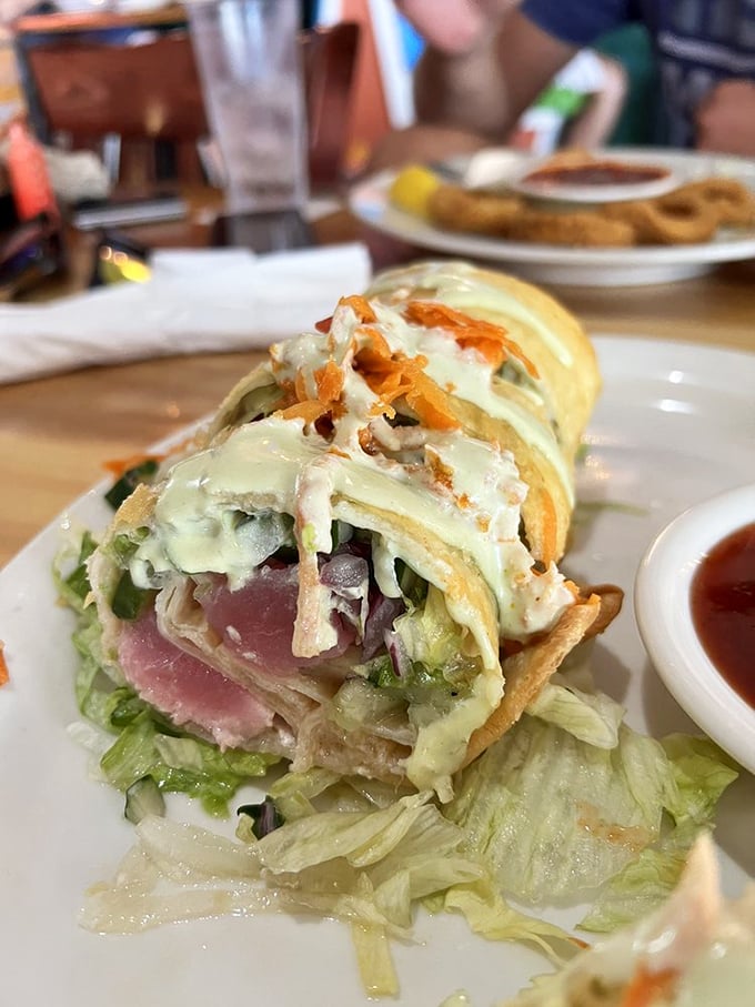 This crispy tuna roll is what happens when sushi goes to finishing school in Florida.
