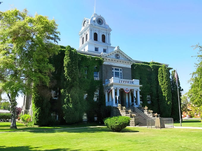 Crook County Courthouse wears its ivy like a distinguished gentleman sports a pocket square—with elegance that's earned through decades of standing tall.
