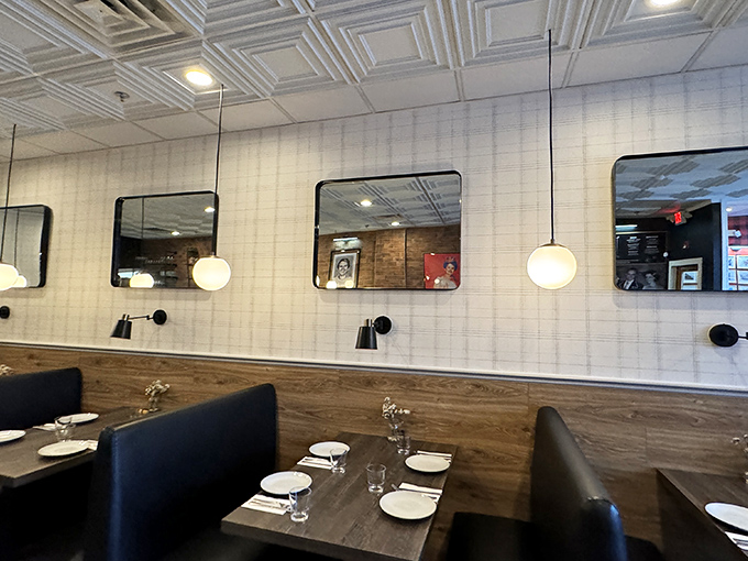 Clean lines, warm wood, and thoughtful lighting create a space that's both modern and timeless – like the best Italian cooking itself.