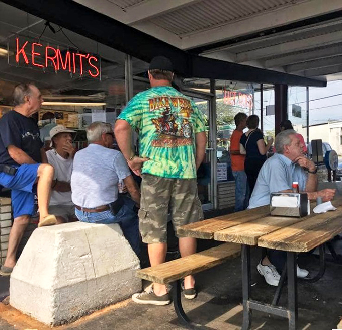 The outdoor seating isn't about the view—it's about community. These wooden benches have hosted more meaningful conversations than most therapists' couches.