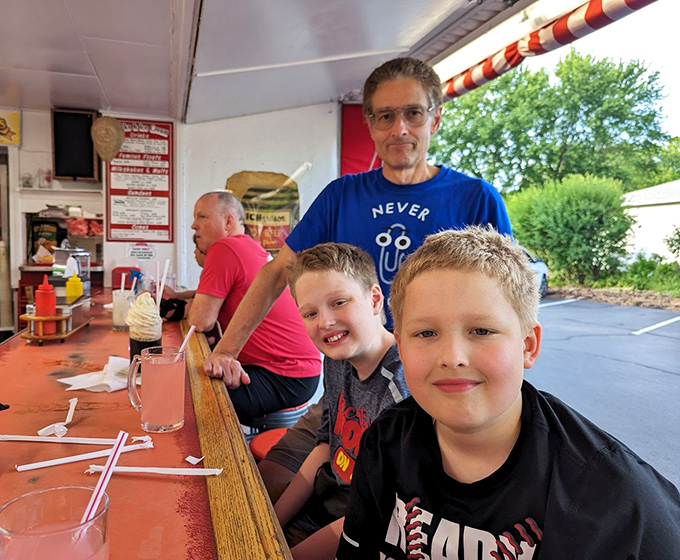 Three generations sharing counter space and creating memories—the true magic of places that remain unchanged in our ever-changing world.