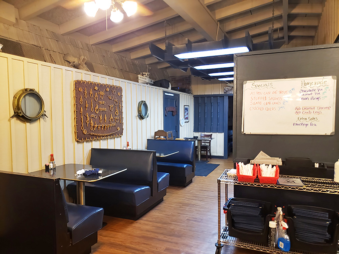 Nautical decor that doesn't try too hard – that "On Deck" plaque and porthole-style accents feel authentically maritime, not theme-park phony.