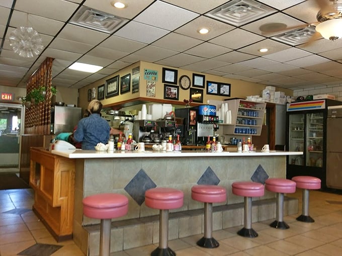 Pink counter stools that have supported generations of Elgin residents—silent witnesses to first dates, family traditions, and solo contemplations.