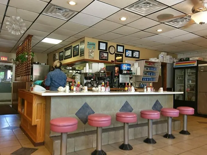 Pink counter stools that have supported generations of Elgin residents—silent witnesses to first dates, family traditions, and solo contemplations.