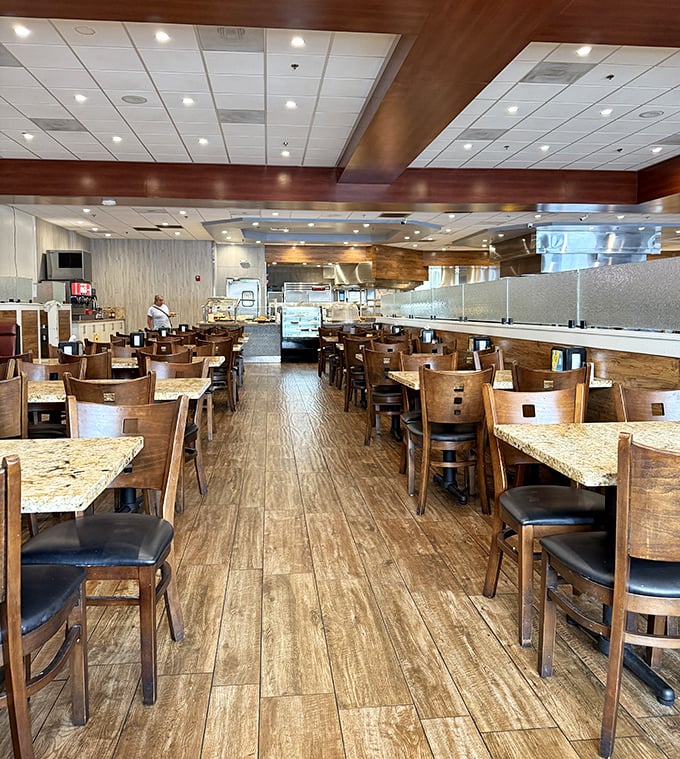 The dining room awaits its next wave of hungry patrons, tables spaced for comfort rather than profit margins.