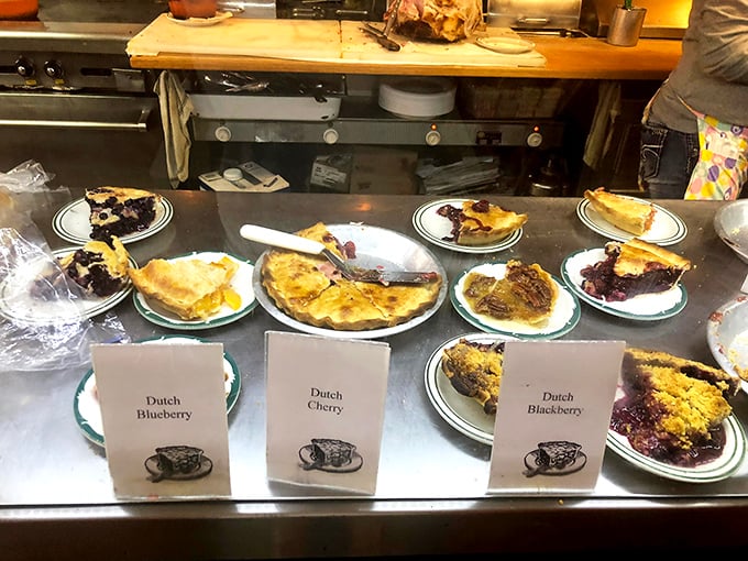 The pie display case—Missouri's version of the Louvre. Each carefully labeled variety represents a different path to happiness.