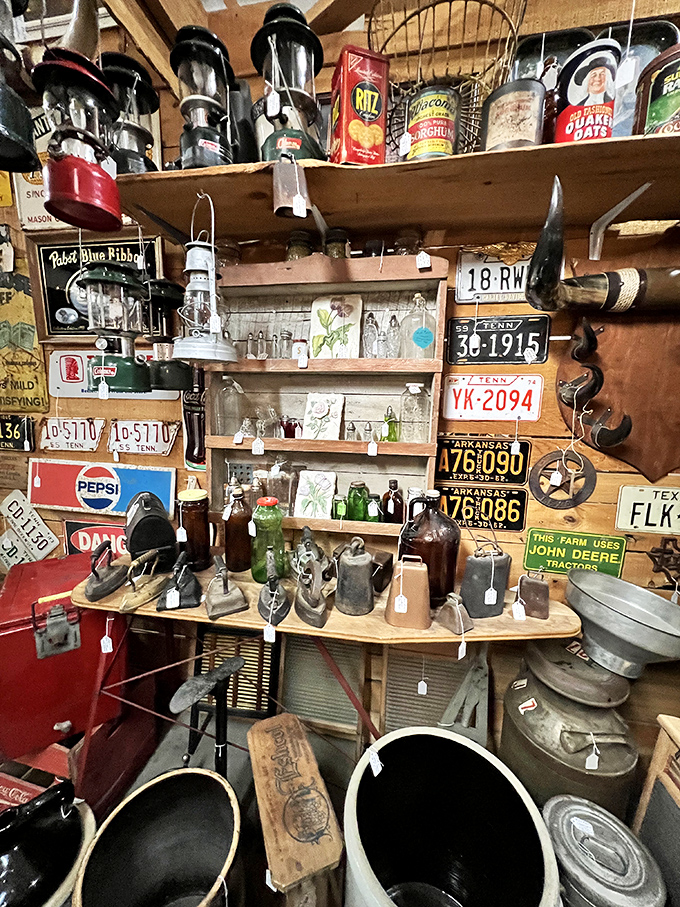 Vintage Americana at its finest. License plates, lanterns, and memorabilia create a time-traveling corner that's pure roadside attraction magic.