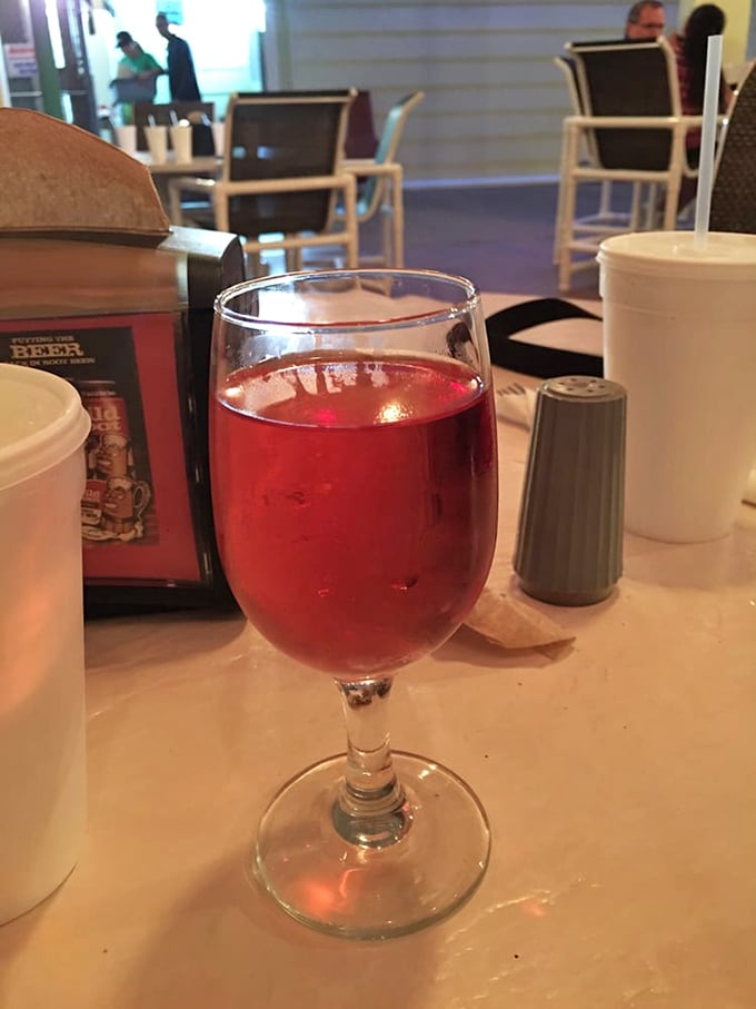 A glass of rosé catching the light just right—because sometimes the perfect accompaniment to seafood isn't another bite, but a well-deserved sip.