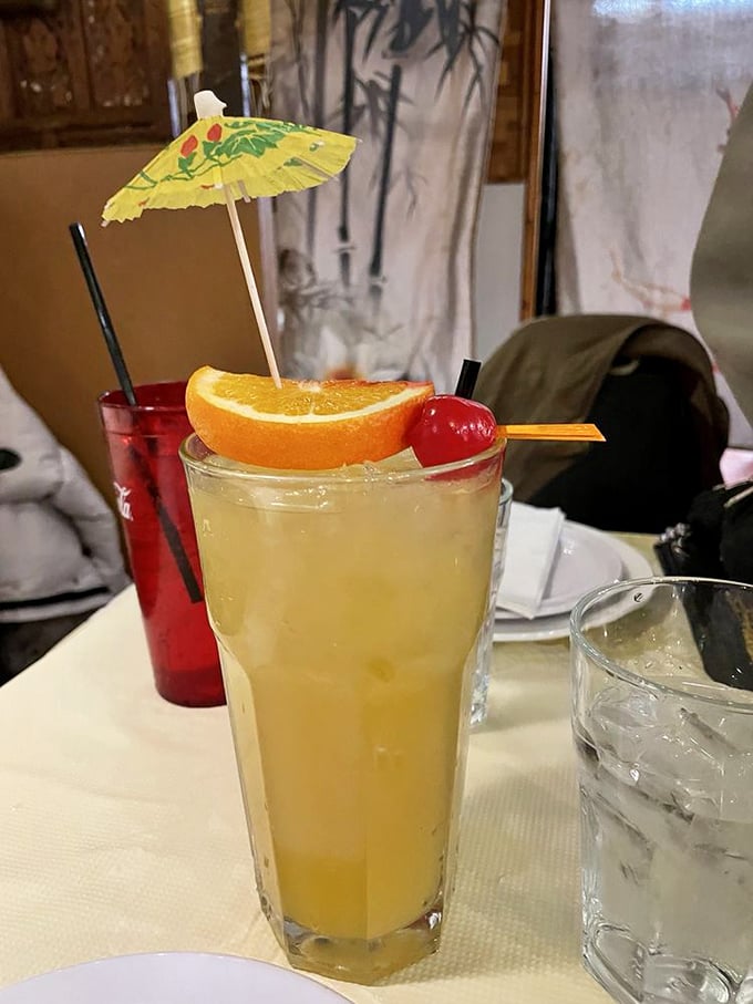 Not just a drink—it's vacation in a glass. That tiny umbrella isn't ironic; it's a promise of the mini-getaway that follows with each sip.