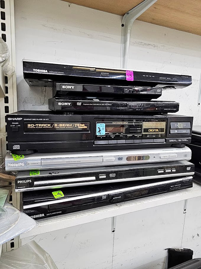 The electronics graveyard—where yesterday's cutting-edge technology awaits resurrection by vintage enthusiasts and practical bargain hunters alike.