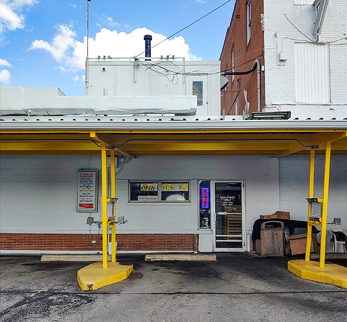 Behind this humble entrance, culinary magic happens daily—the stage door to a performance of comfort food that's been running longer than Phantom of the Opera.