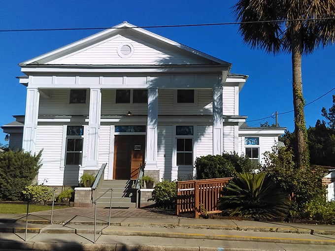 The First Baptist Church stands as a bright sentinel of island faith, its classic architecture a reminder of Cedar Key's deep historical roots.