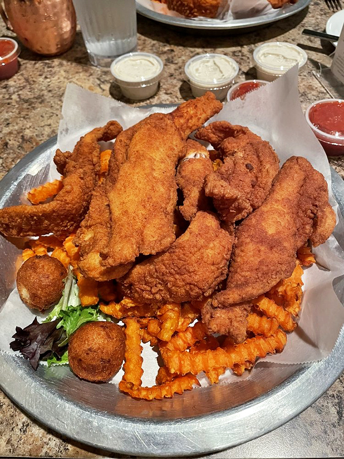 Fish and chips that could make a British pub jealous, with a golden crust that shatters with satisfying crispness at first bite.