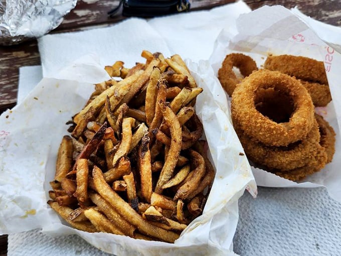 Fries with personality and onion rings with attitude. These aren't sides—they're co-stars in your lunch production. 