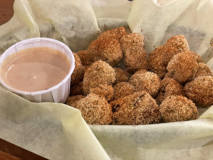 Fried okra: the South's answer to popcorn, with a seasoned coating that makes you forget you're technically eating vegetables.