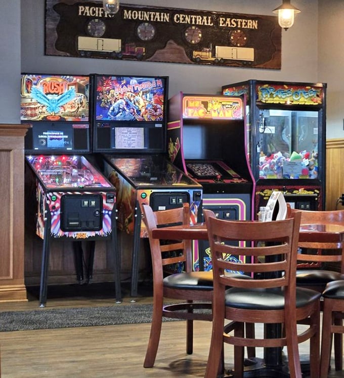 Classic arcade games waiting for quarters and nostalgia. Where parents suddenly remember skills they haven't used since Reagan was president.