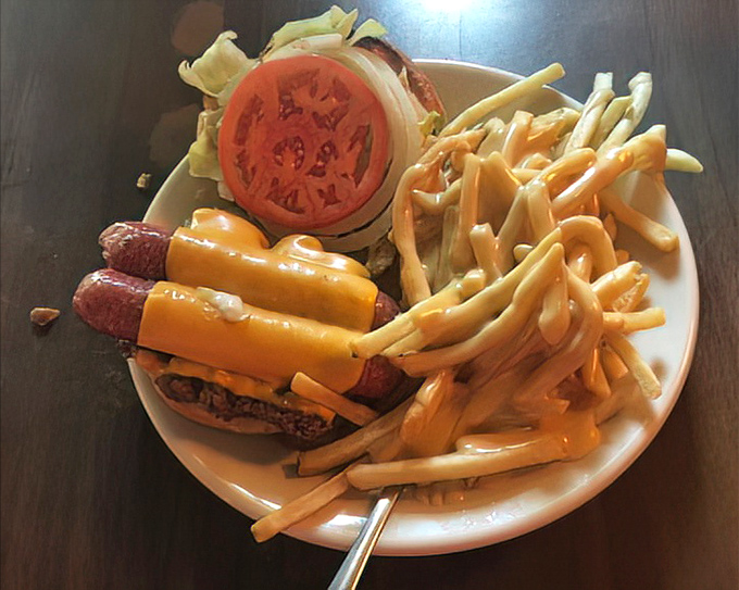The legendary Girth Burger with mettwurst and melted cheese—a Cincinnati specialty that makes out-of-towners wonder why their hometown doesn't have something this good.