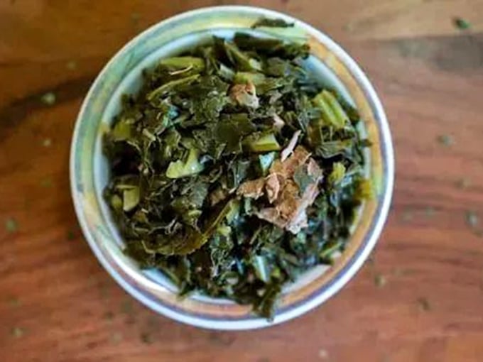 Collard greens done right – tender yet substantial, with just enough pot liquor to make you consider drinking what's left in the bowl.