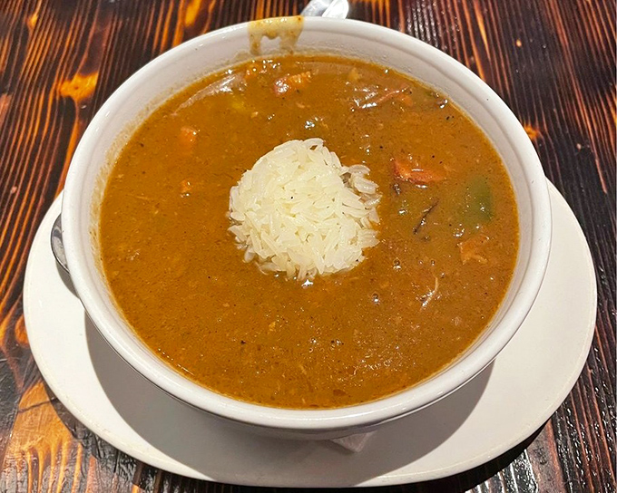 A proper gumbo is like a warm hug from someone who really knows how to cook. That island of rice in the center is begging for your spoon.
